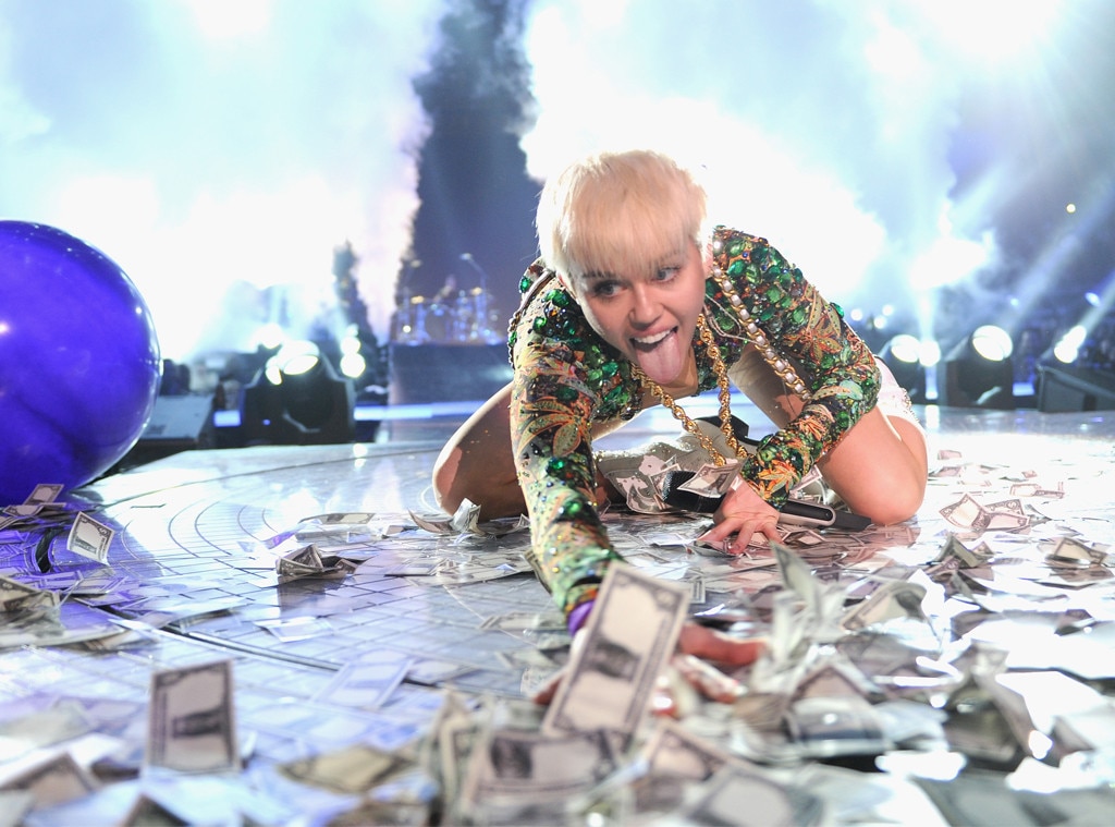 Money-Grabber from Miley Cyrus' Wildest Concert Pics | E! News Money-Grabber from Miley Cyrus' Wildest Concert Pics | E! News