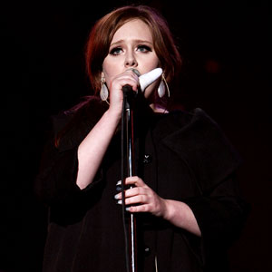 Adele "Doing Really Well" After Successful Throat Surgery - E! Online