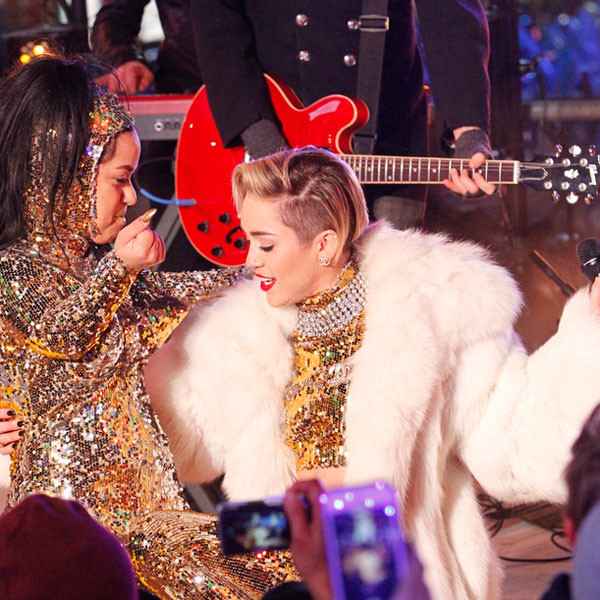 Watch: Miley Sings, Jenny McCarthy Licks a Hammer to Ring in 2014 - E ...