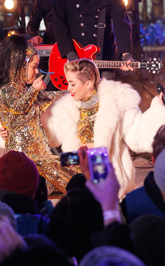 Watch: Miley Sings, Jenny McCarthy Licks a Hammer to Ring in 2014 - E ...