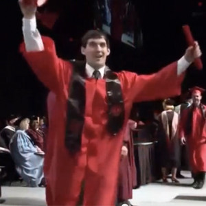 Student Attempts a Backflip at College Graduation, Fails Miserably