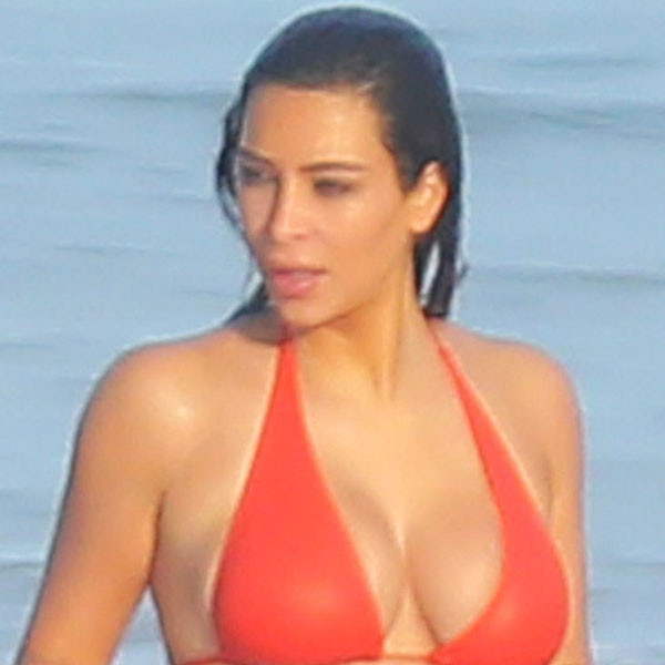 Kim Kardashian Flaunts Cleavage In Red Bikini—see The Photo E Online
