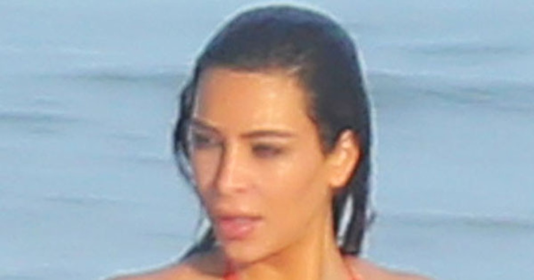Kim Kardashian Flaunts Cleavage In Red Bikini—see The Photo E Online