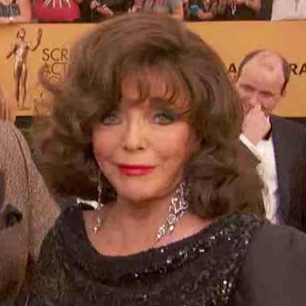 Watch: Dame Joan Collins Dishes on Her Royals Character