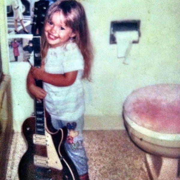A Young Minka Kelly Rocks Out in the Bathroom With a Guitar: See the ...
