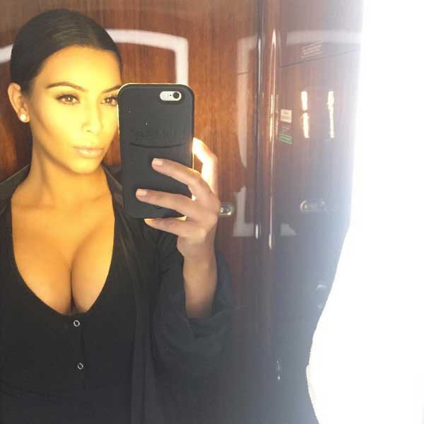 Kim Kardashian Shows Massive Cleavage In Sexy Selfie On Plane Pic E News
