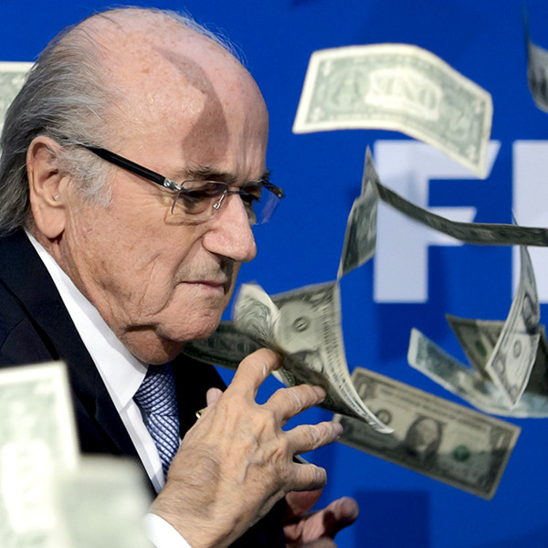 Watch: Prankster Throws Wads of Cash at Sepp Blatter