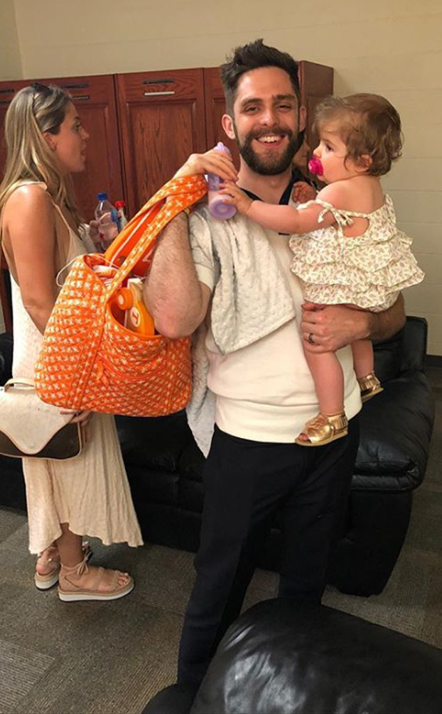 Daddy Duties from Thomas Rhett's Cutest Father Moments | E! News