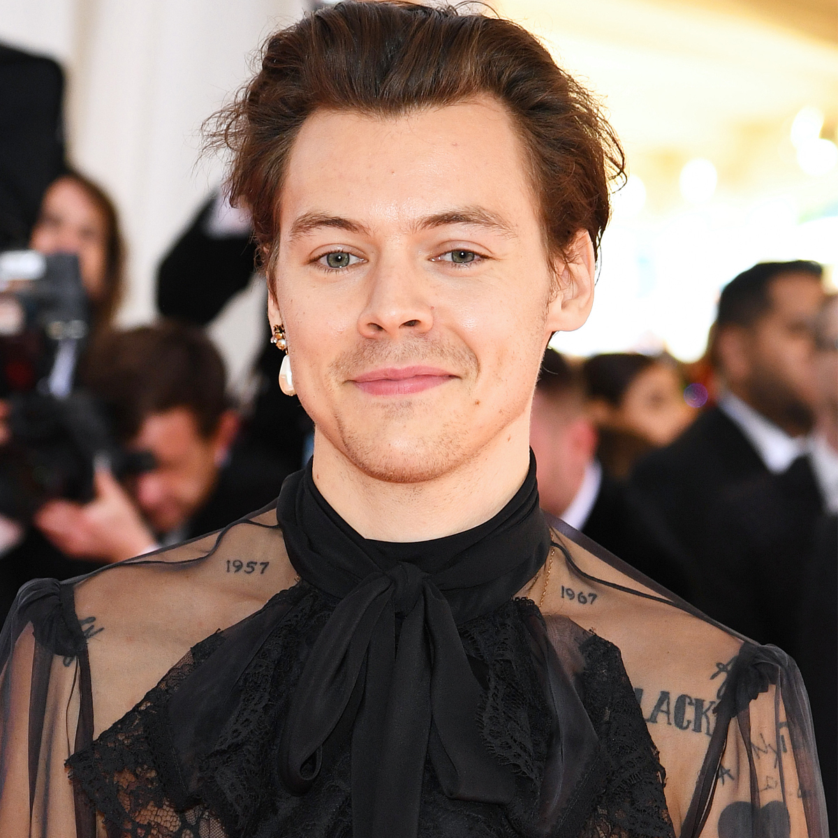 Harry Styles Hits Back at Candace Owens' "Bring Back Manly Men" Remark
