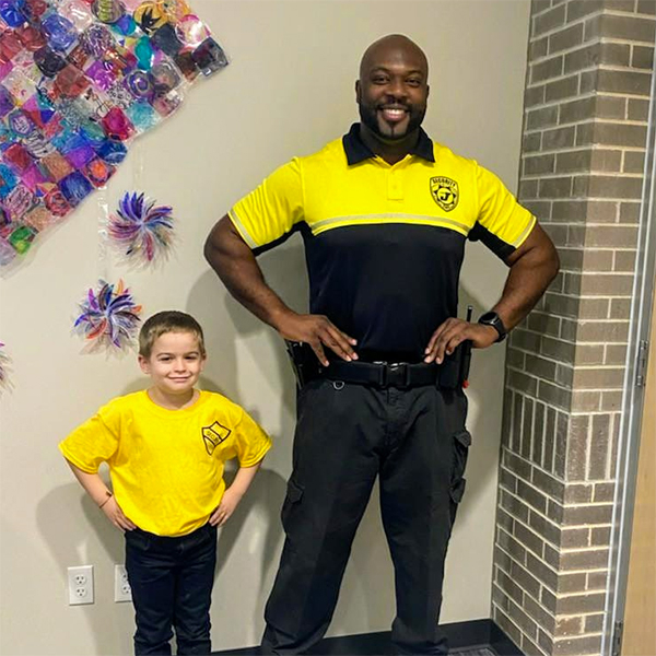 Kid Dresses as Security Guard for ''Dress As Your Fave Person Day''