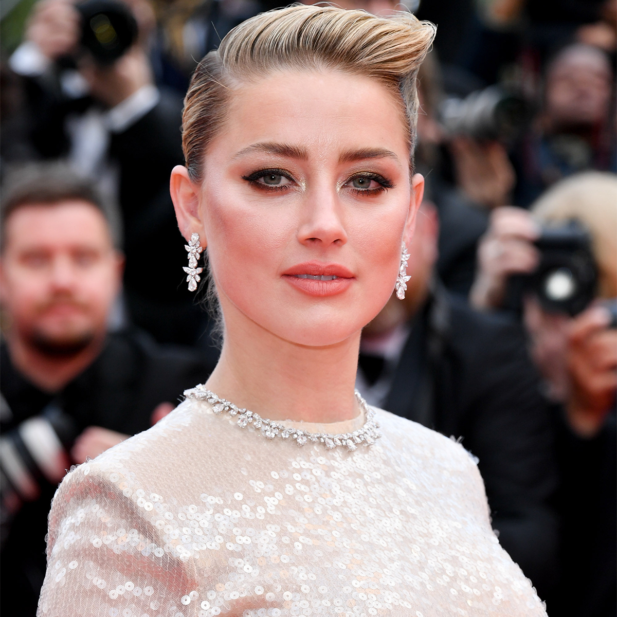 Amber Heard Reacts to "Insane" Rumor She Was Cut From Aquaman 2